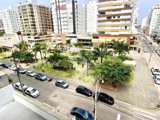 Apartamento de 3 suítes de frente com box/vaga de garagem em Capão da Canoa!