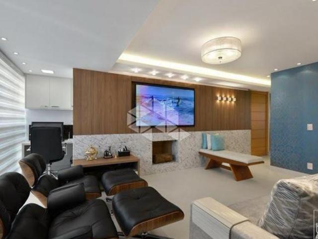 Apartamento de 3 suites mobiliado e com 2 vagas individuais no bairro Jardim Europa em Porto Alegre