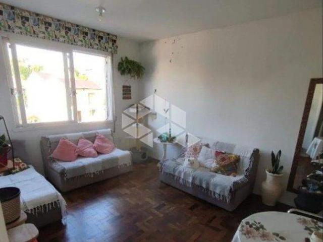 Apartamento de 3dorm semimobiliado
