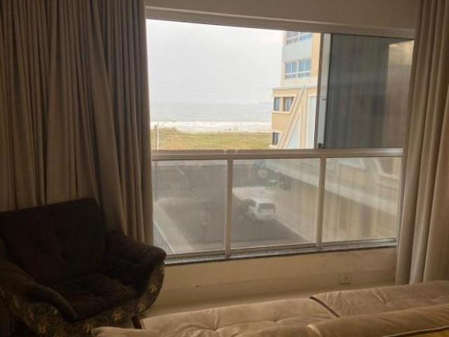 APARTAMENTO DE TRÊS DORMITÓRIOS COM VISTA PARA O MAR