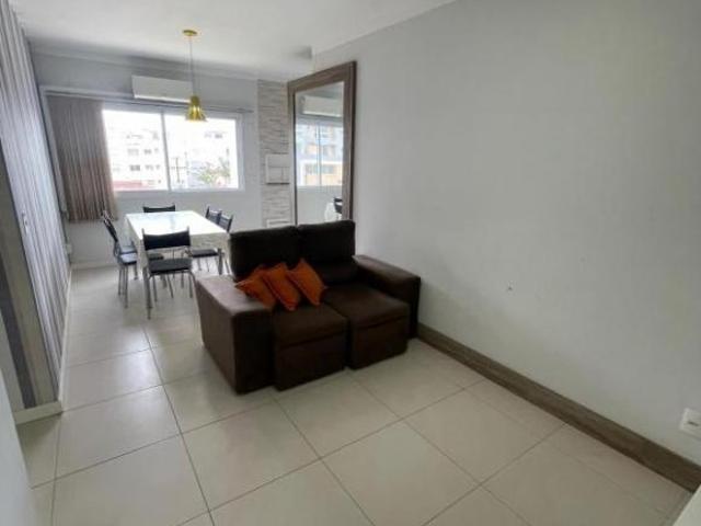 apartamento de dois dormitórios no centro de tramandaí