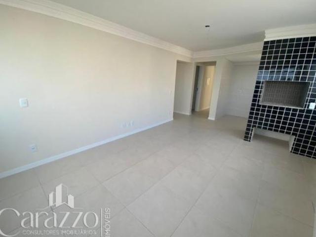 APARTAMENTO DE DOIS DORMITÓRIOS NO CENTRO DE TRAMANDAÍ
