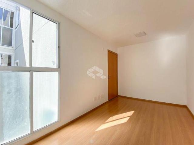 Apartamento de dois dormitórios no condominio porto itapuã viamão