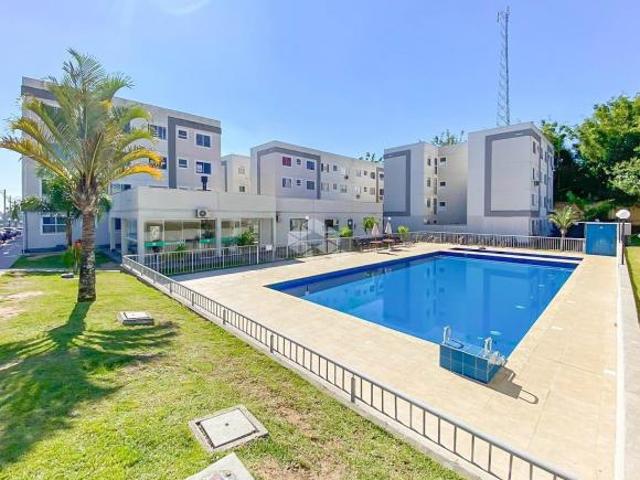 Apartamento de dois dormitórios no condominio porto itapuã viamão