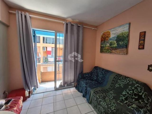 Apartamento de dois dormitorios com sacada e garagem rotativa no Sarandi