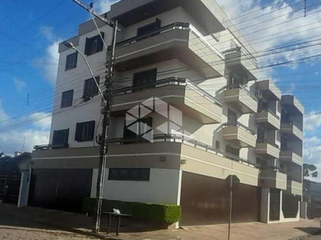 Apartamento de dois dormitórios e vaga de garagem no centro de Vacaria