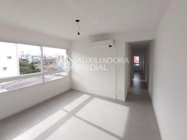 Apartamento de dois quartos com vaga de garagem a venda no Bairro Menino Deus Porto Alegre