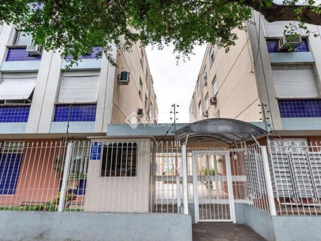 APARTAMENTO DE FRENTE COM TRÊS QUARTOS E GARAGEM COBERTA