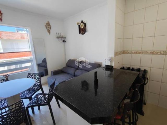 Apartamento de frente com 2 dormitórios mobiliado no Centro de Capão da Canoa