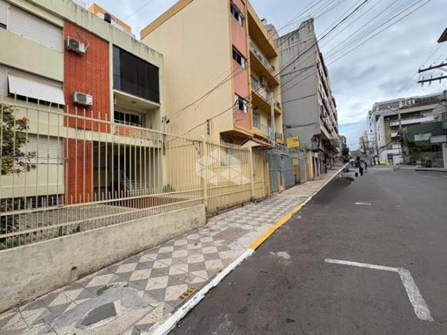 APARTAMENTO DE FRENTE, NO CENTRO DE SANTA MARIA COM 2 DORMITÓRIOS E VAGA