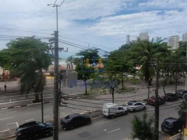 Apartamento de frente para a praia, 3 dormitórios, 1 suíte e duas vagas de garagem