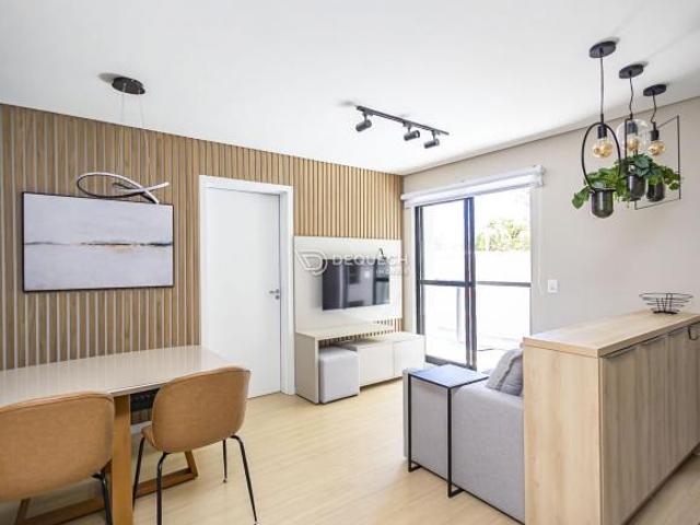 Apartamento decorado com churrasqueira na sacada