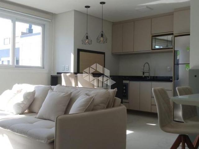 Apartamento dois dormitórios mobiliado e decorado novo frente a praça Capão da Canoa RS