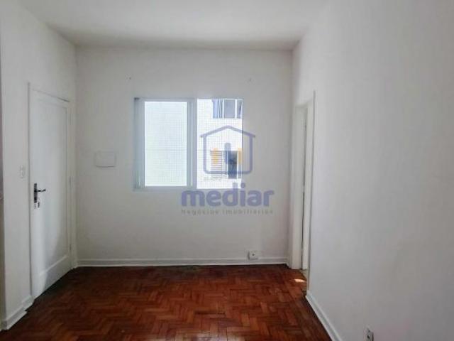 Apartamento dois dormitórios, na orla da praia