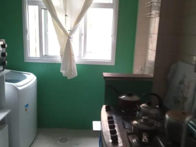Apartamento dois dormitórios térreo com uma vaga escriturada