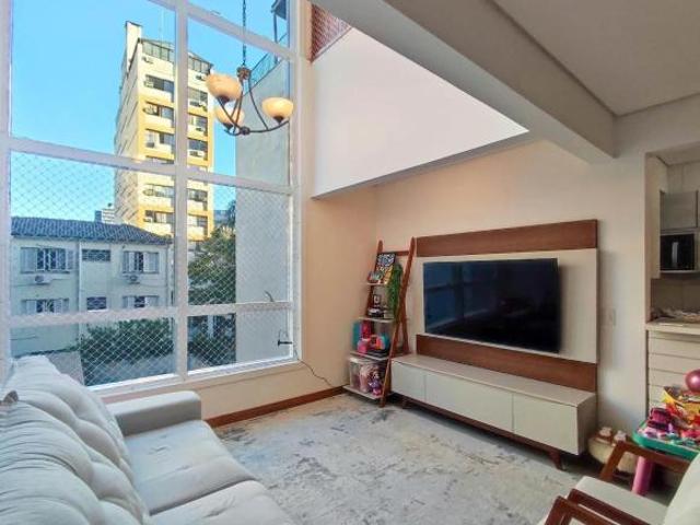 Apartamento duplex com 2 dormitórios, 1 suíte, churrasqueira e 1 vaga de garagem
