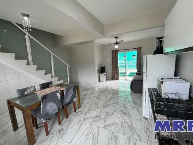Apartamento duplex á venda em Ubatuba. 2 dormitórios. 2 vagas. Com piscina