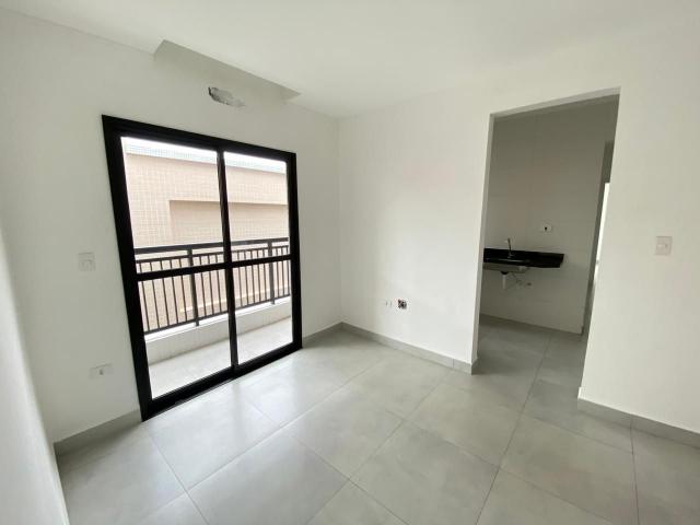 Apartamento em Vila Tupi, Praia Grande/SP de 57m² 2 quartos à venda por R$ 530.366,41