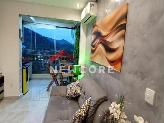 Apartamento em Avenida Nilo Braga Garcez Martim de Sá Caraguatatuba/SP