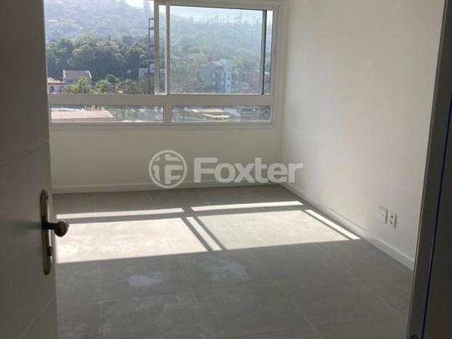 Apartamento em condomínio com 2 dormitórios em Porto Alegre