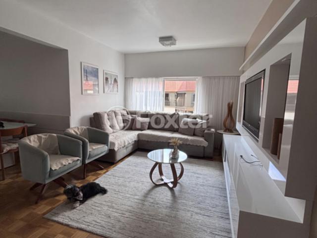 Apartamento em condomínio com 3 dormitórios em Porto Alegre