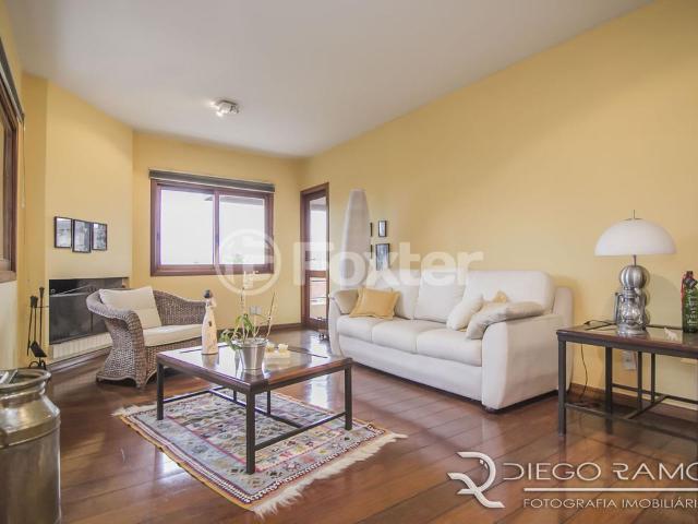 Apartamento em condomínio com 3 dormitórios em Porto Alegre