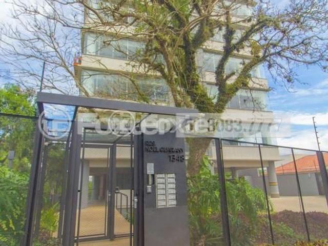 Apartamento em condomínio com 3 dormitórios em Porto Alegre