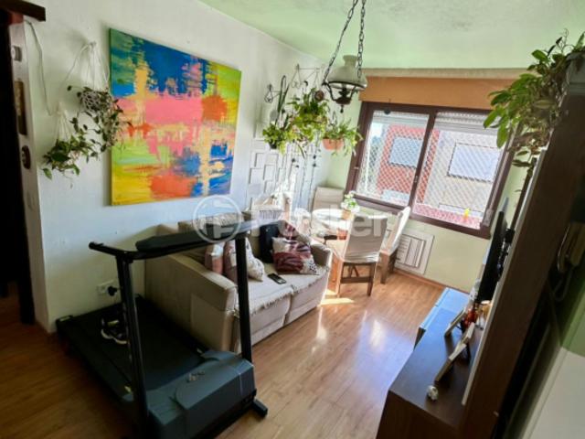 Apartamento em condomínio com 3 dormitórios em Porto Alegre
