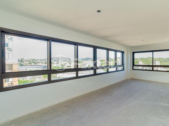 Apartamento em condomínio com 3 dormitórios em Porto Alegre