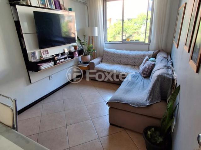 Apartamento em condomínio com 3 dormitórios em Porto Alegre