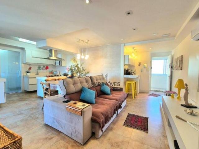 Apartamento em excelente localização com varanda gourmet na região da praia das Pitangueiras no Guar