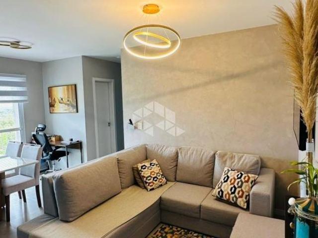 apartamento em ótima localização na entrada da cidade com dois dormitórios sacada e garagem