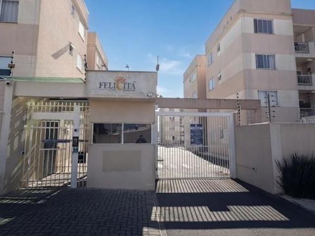 APARTAMENTO EM PINHAIS COM SACADA E CHURRASQUEIRA NO TÉRREO