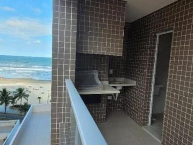 Apartamento 1 dorm sendo 1 suíte em Prédio Frente Mar jdm Real Varanda Go.