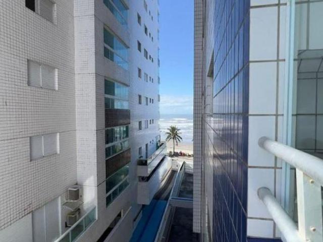 Apartamento em prédio frente mar em Mongaguá com 2 quartos, 1 suíte, varanda gourmet, mobiliado e vi