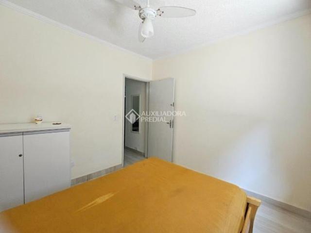Apartamento em prédio FRENTE MAR em Praia Grande, Vila Mirim
