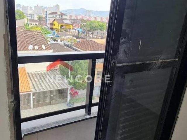 Apartamento em Rua Dona Anita Costa Vila Voturua São Vicente/SP