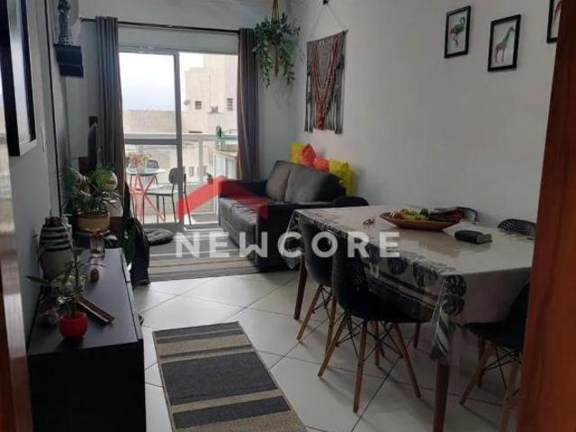 Apartamento em Rua Meinacos Tupi Praia Grande/SP