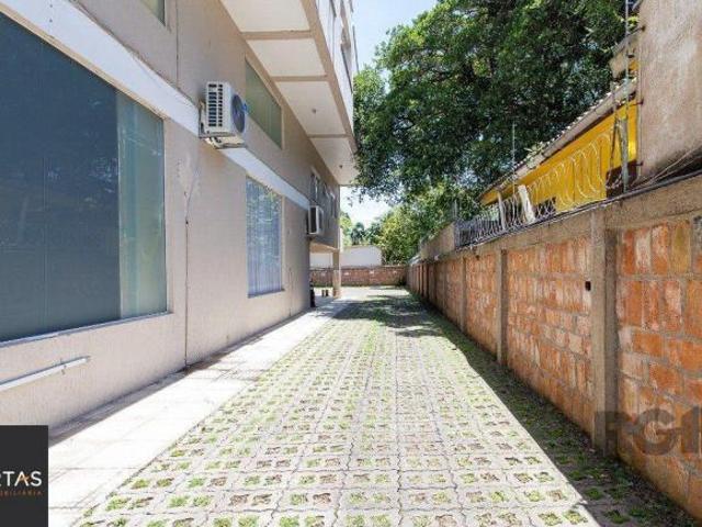 Apartamento excelente no Condomínio Portosul, localizado no bairro Tristeza