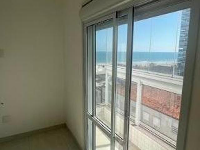 Apartamento frente mar no canto do forte em Praia Grande com vista mar e 4 quartos sendo 3 vagas e l