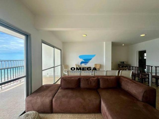 Apartamento frente mar à venda na Praia das Pitangueiras no Guarujá | Omega Imóveis