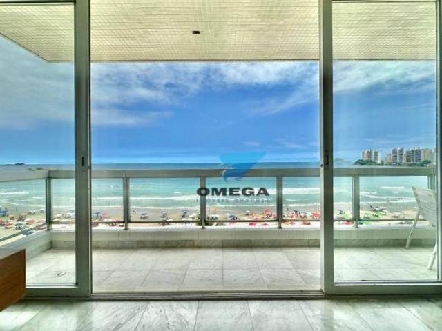 Apartamento frente mar à venda na praia das Pitangueiras no Guarujá I Omega Imoveis