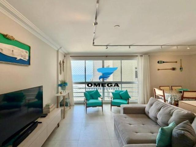Apartamento frente mar à venda na praia das Pitangueiras no Guarujá I Omega Imoveis