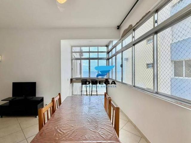 Apartamento frente mar à venda na praia das Pitangueiras no Guarujá I Omega Imoveis