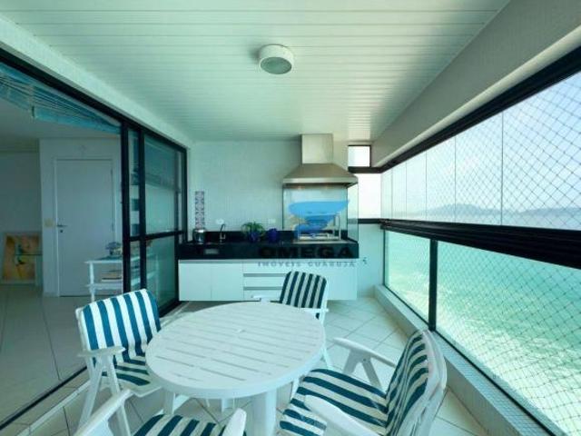 Apartamento frente mar á venda na praia das Pitangueiras no Guarujá I Omega Imoveis