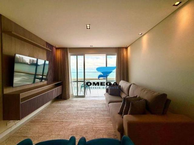 Apartamento frente mar à venda na praia das Pitangueiras no Guarujá I Omega Imoveis