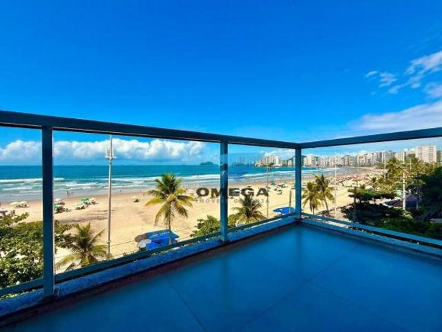 Apartamento frente mar à venda na praia das Pitangueiras no Guarujá I Omega Imoveis
