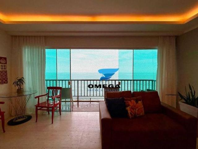 Apartamento frente mar à venda na praia das Pitangueiras no Guarujá I Omega Imoveis
