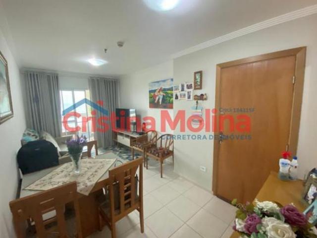 Apartamento frente mar com 2 dormitórios, sendo 1 suíte, no Maracanã Praia Grande/SP