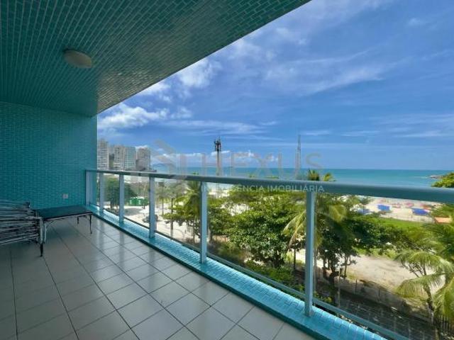 Apartamento frente mar com varanda na Praia das Pitangueiras, Guarujá